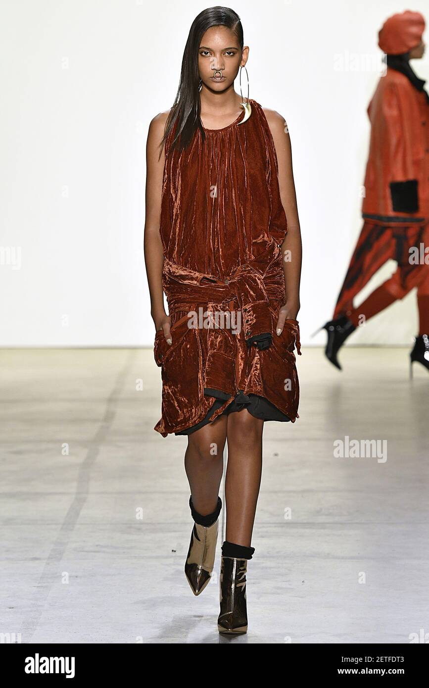Model walks on the runway during the Nicholas K Fashion Show at FW17 ...