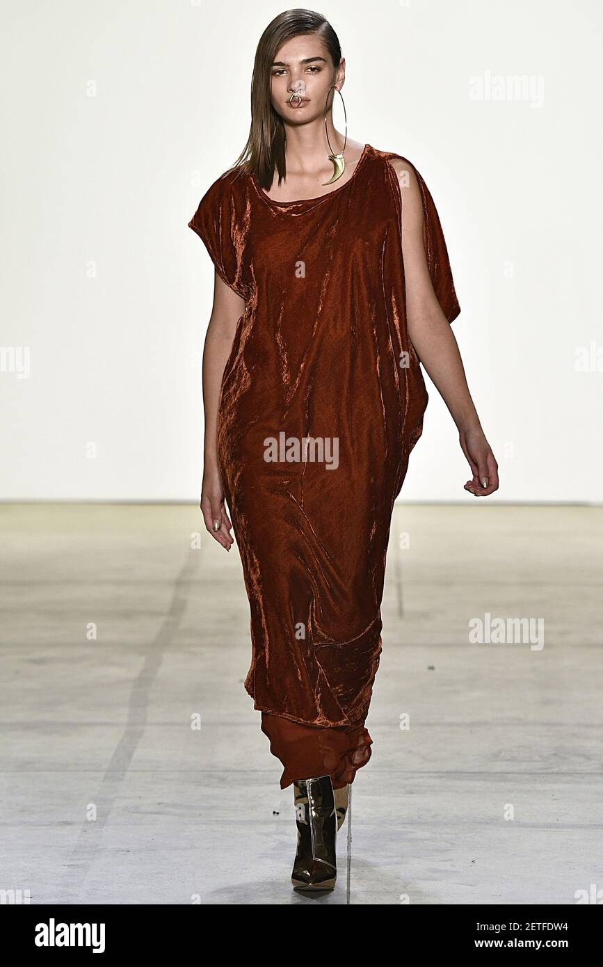 Model walks on the runway during the Nicholas K Fashion Show at FW17 ...