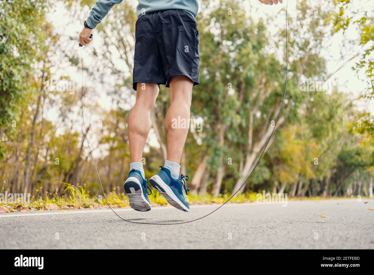 Male using a jump rope hi-res stock photography and images - Alamy