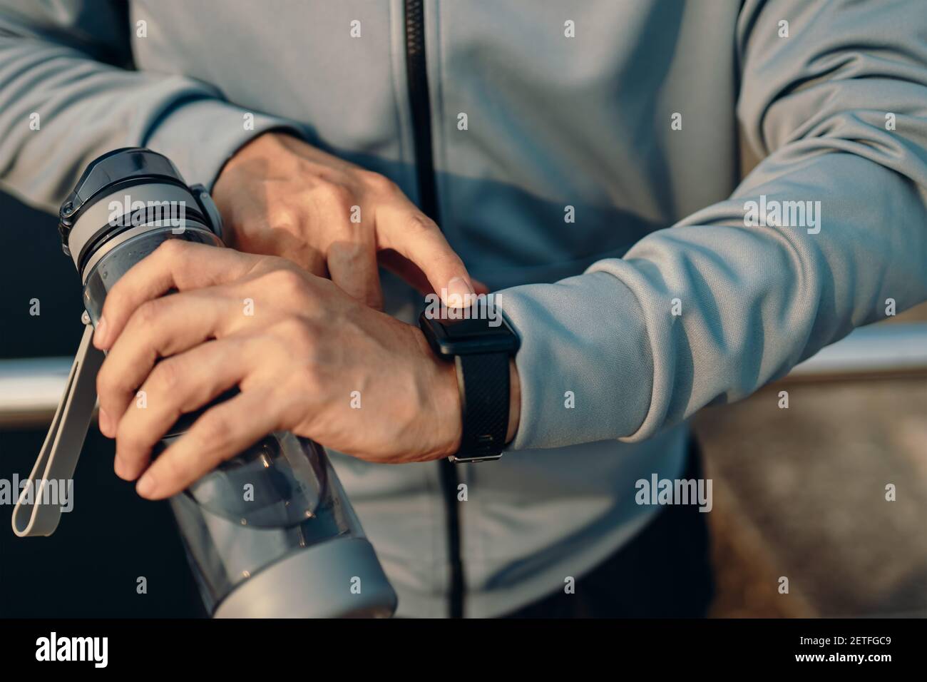 Hand sportsman smartwatch during workout hi-res stock photography and ...