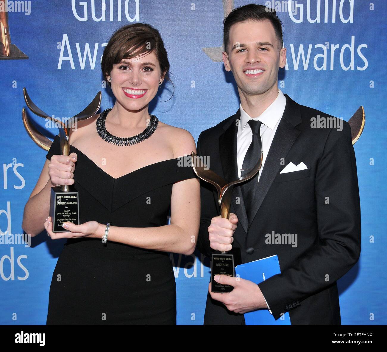 Lauren Signorino and Mike Zunic with their award at the 2017 Writers ...