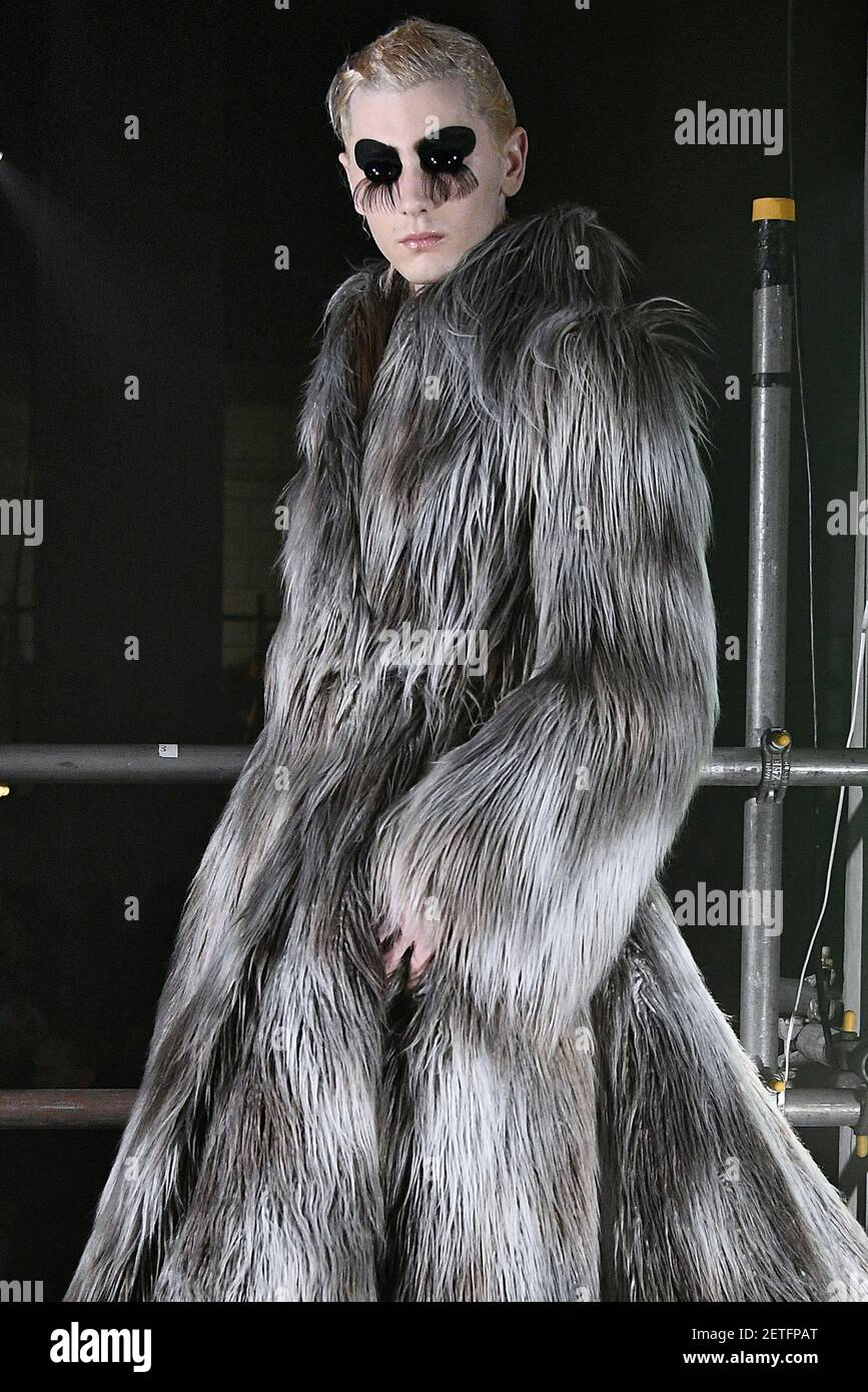 Model Jack Hope walks on the runway during the Gareth Pugh Fashion Show ...