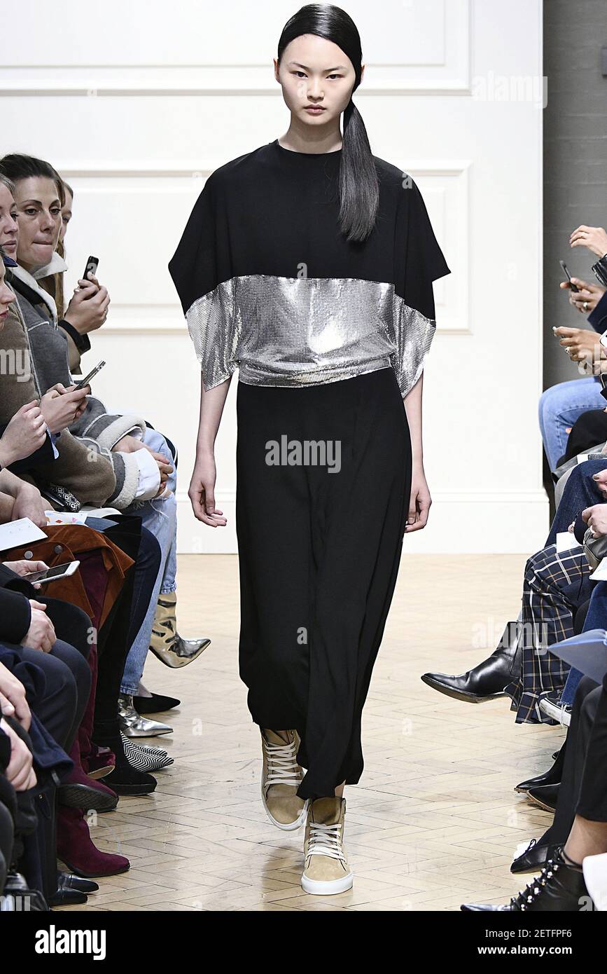 Model Cong He walks on the runway during the J.W. Anderson Fashion Show ...