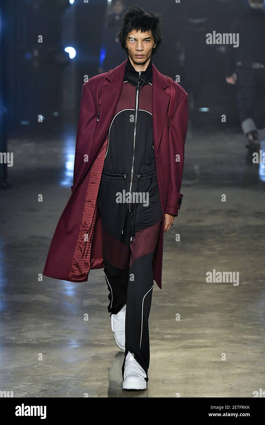 Model Filip Roseen walks on the runway during the Versus Versace ...