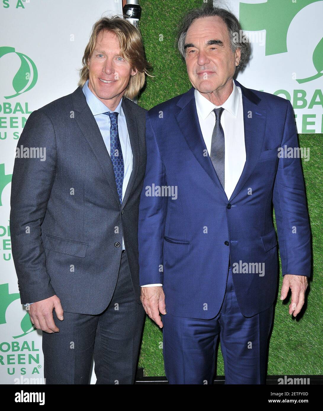 (L-R) Douglas Stoup and Oliver Stone arrives at the 14th Annual Global ...
