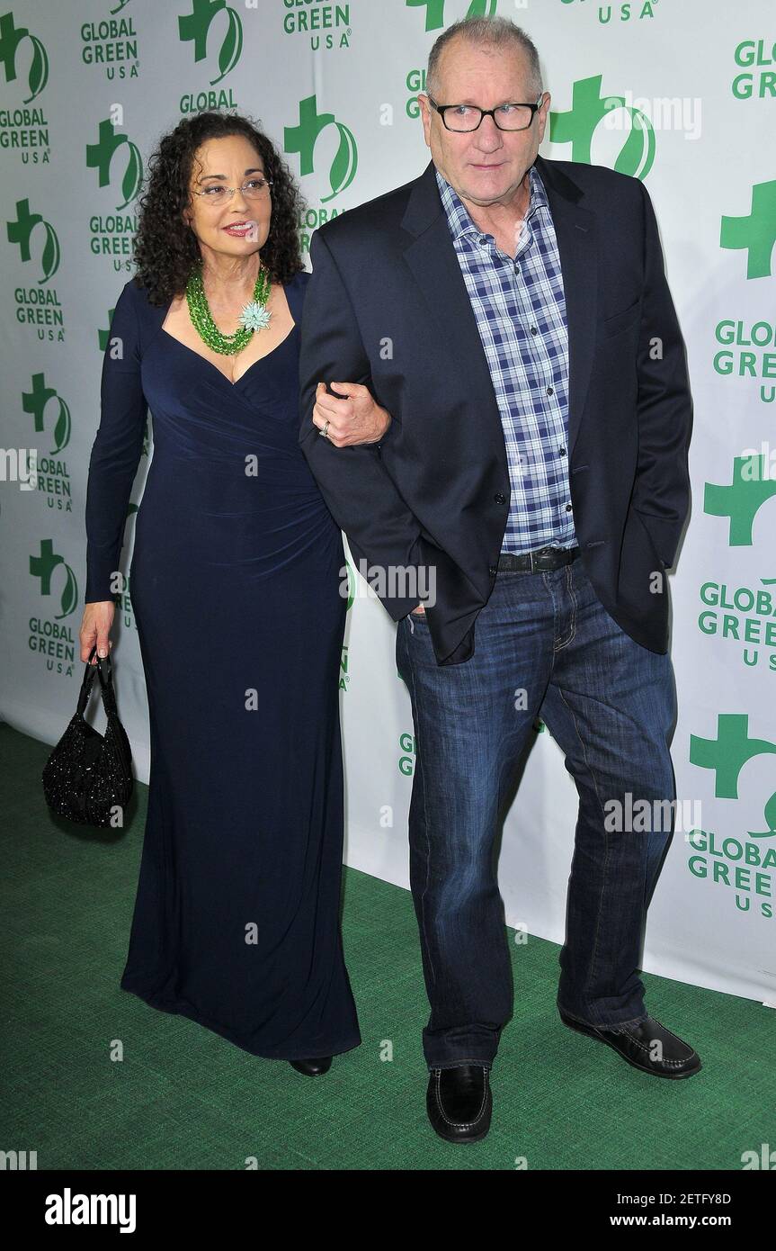 (L-R) Catherine Rusoff and Ed O'Neill arrives at the 14th Annual Global ...