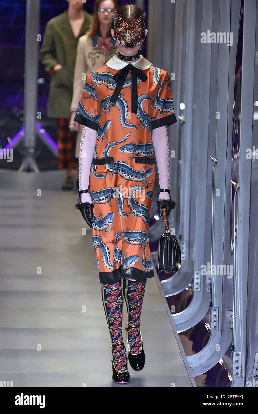 A model walks on the runway during the Gucci Fashion Show at FW17 held ...