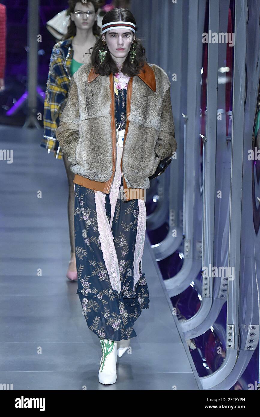 A model walks on the runway during the Gucci Fashion Show at FW17 held ...