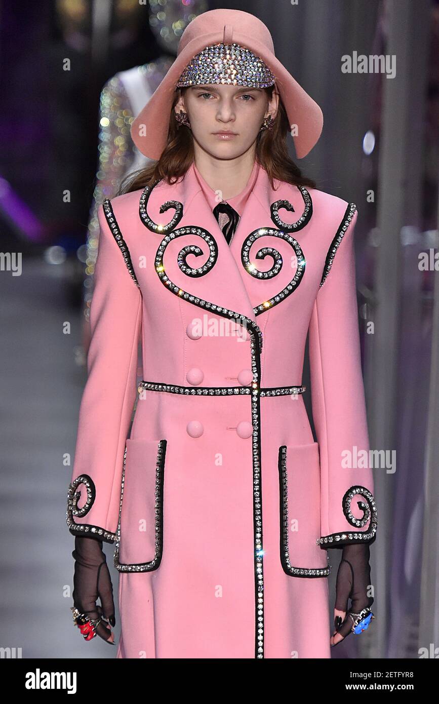 A model walks on the runway during the Gucci Fashion Show at FW17 held ...