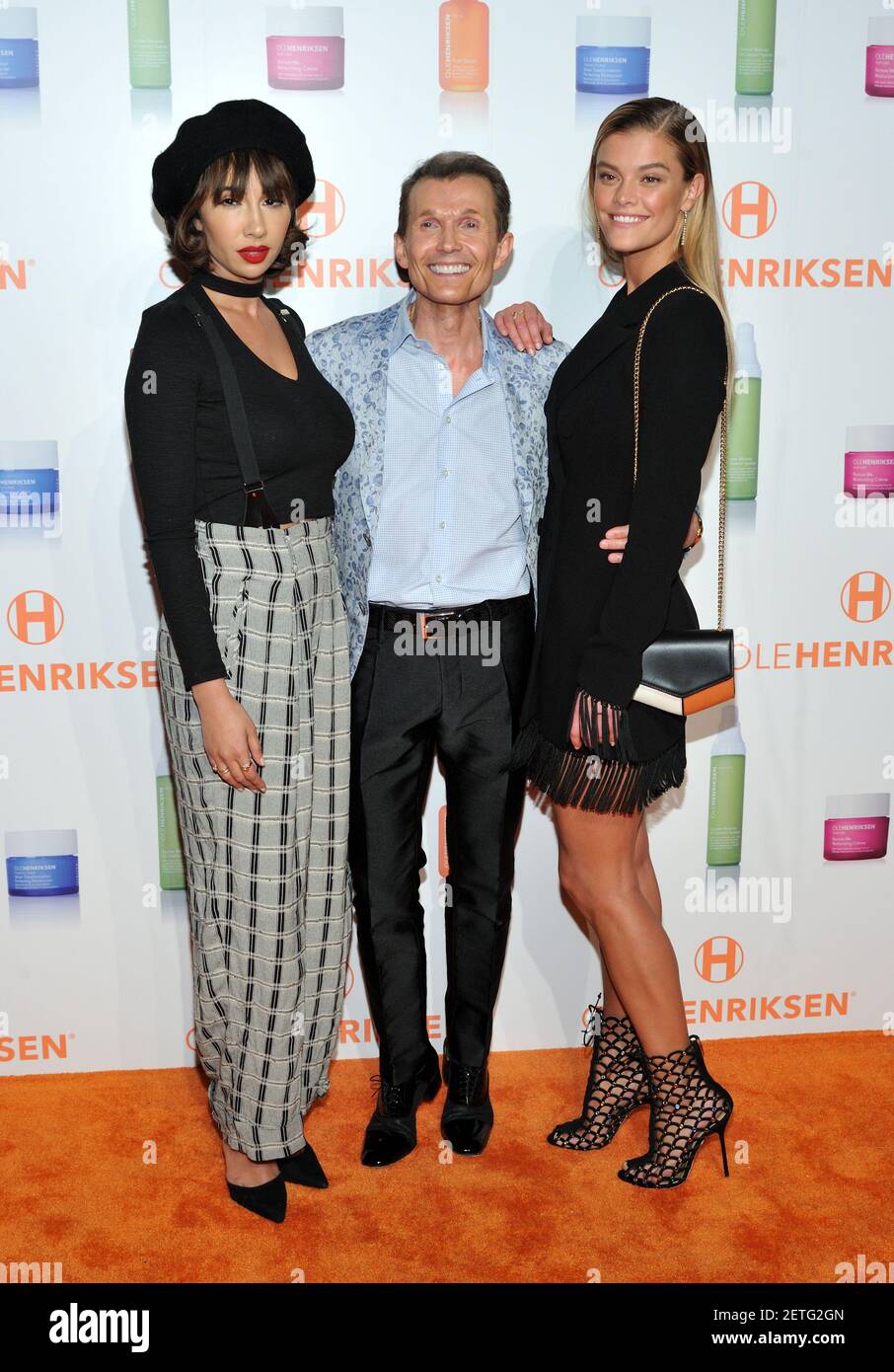 L-R: Actress Jackie Cruz, designer Ole Henrikson and SI model Nina ...