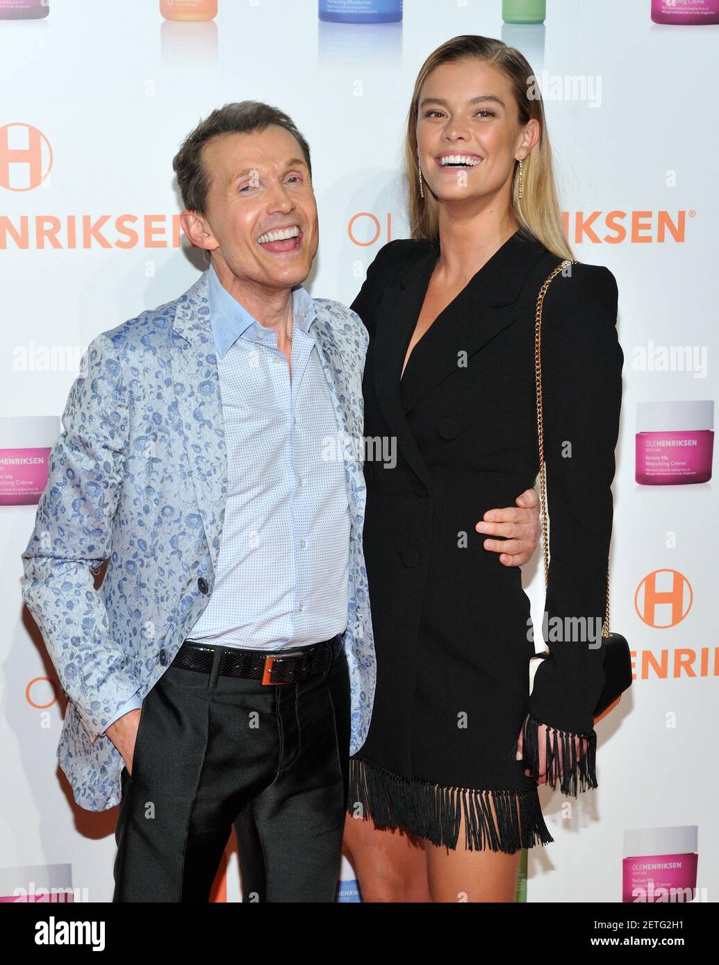 Designer Ole Henrikson and SI model Nina Agdal attend the celebration ...