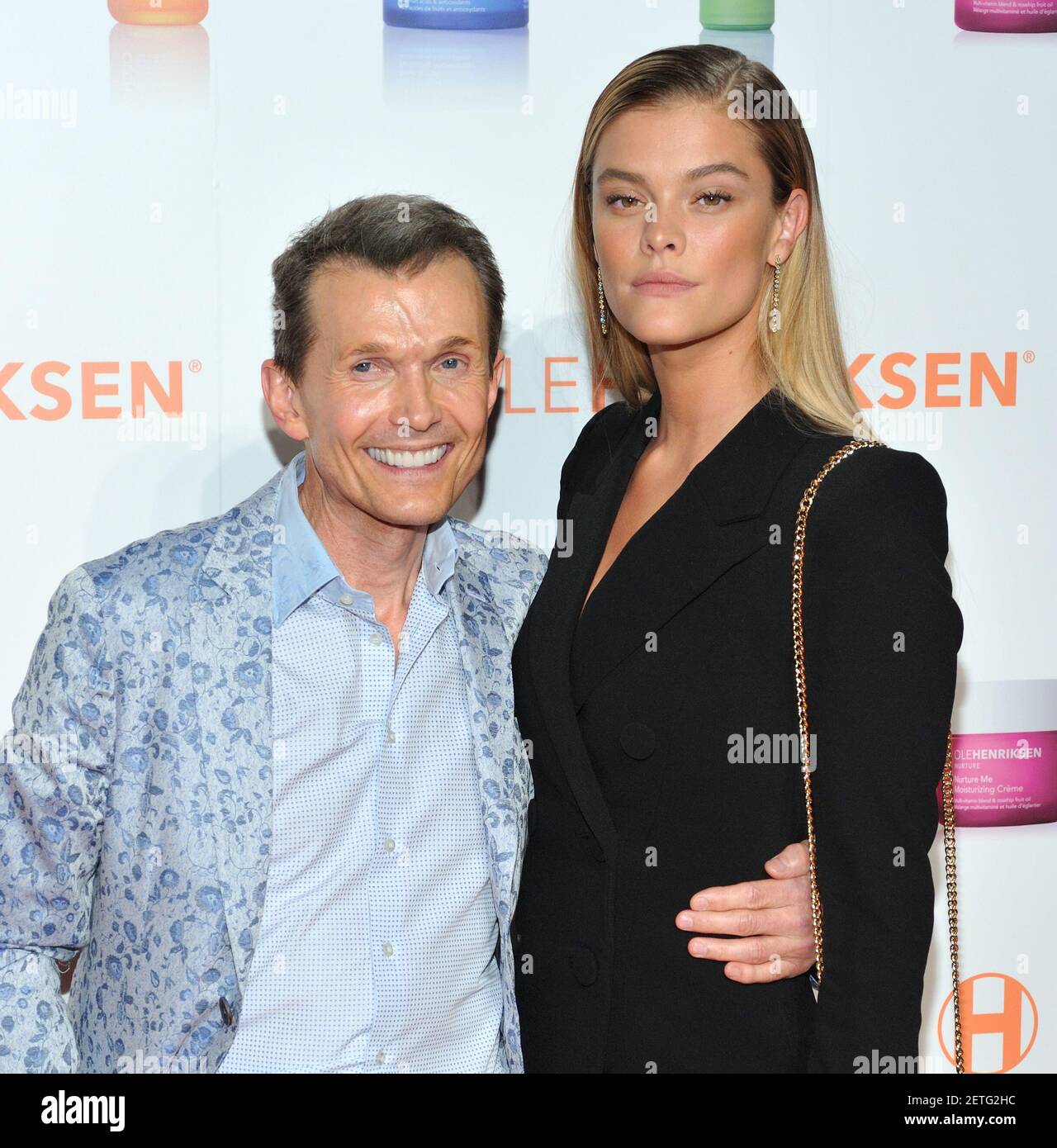 Designer Ole Henrikson and SI model Nina Agdal attend the celebration ...