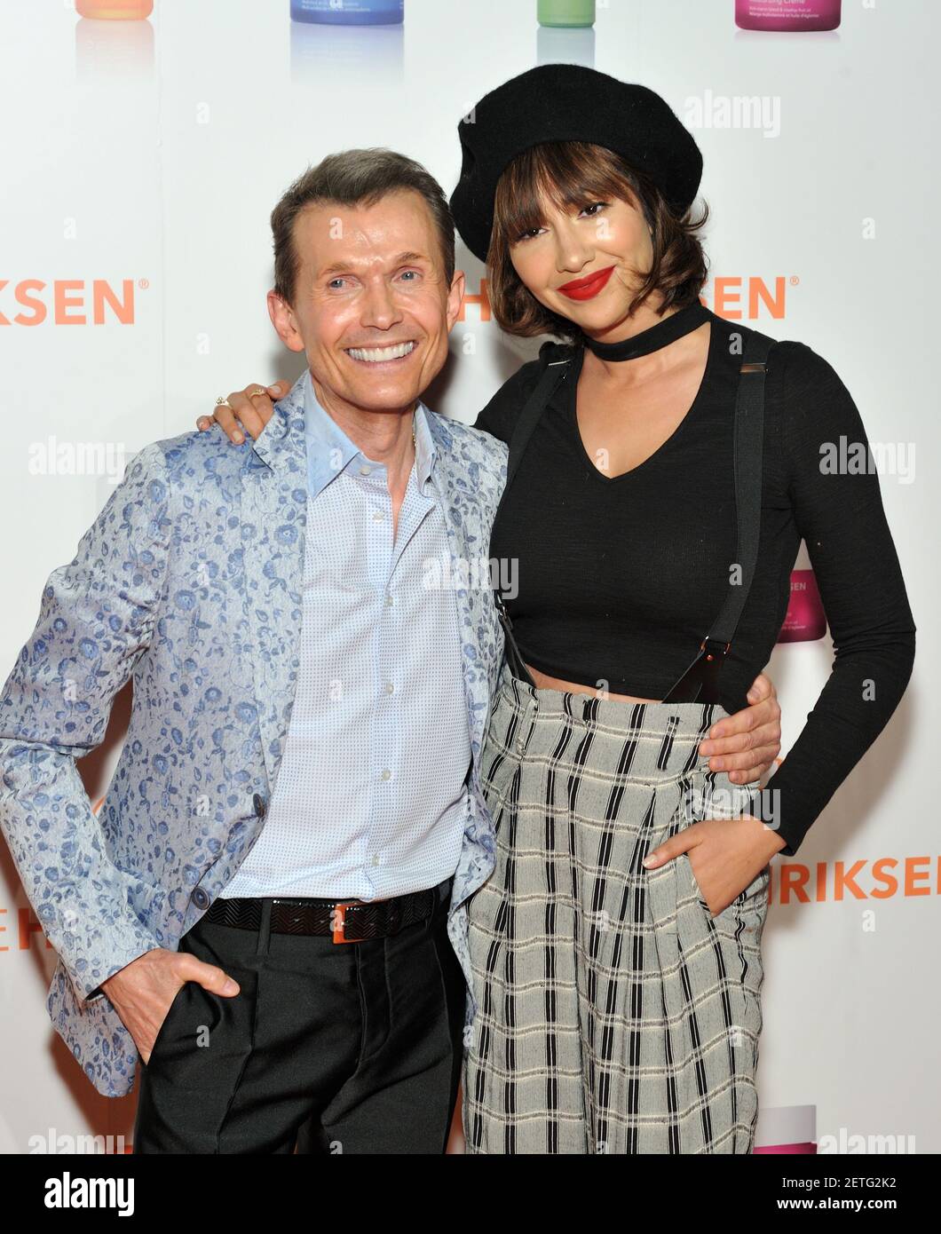 Designer Ole Henrikson and actress Jackie Cruz attend the celebration ...