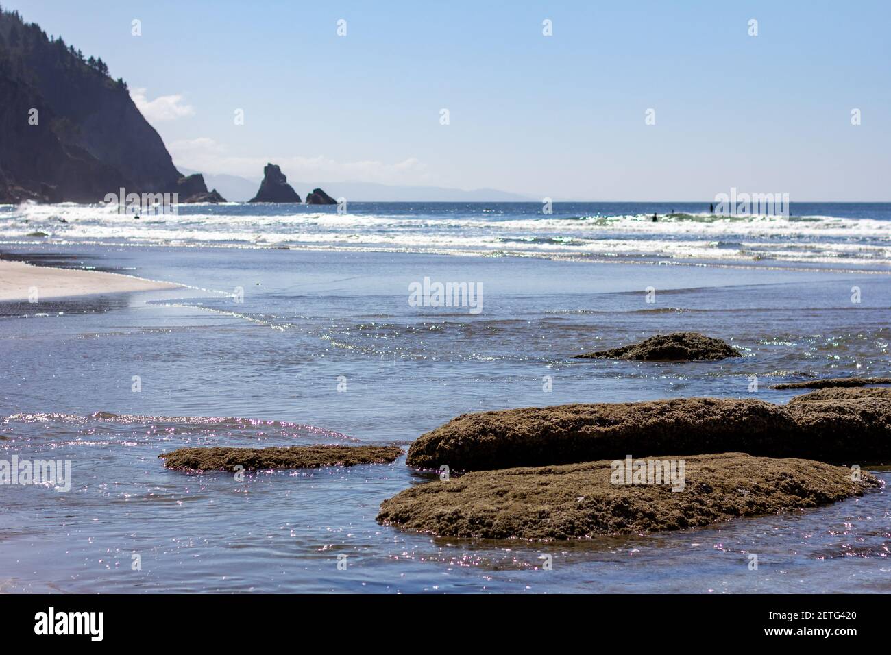 Rocks in the surf at Short Sand Beach looking across Smuggler Cove on ...