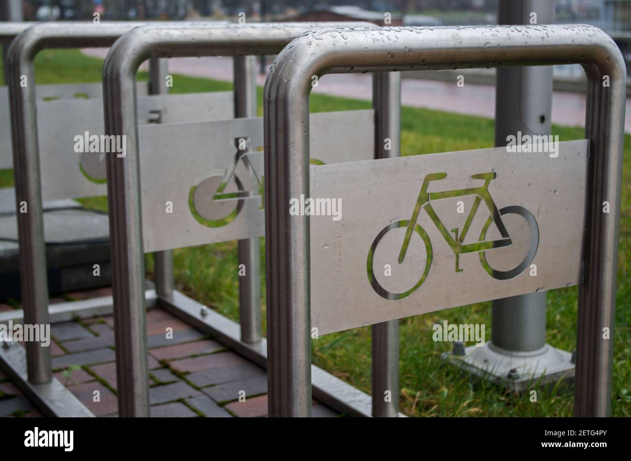 Bolted to pavement structure of a series of metal vertical arcs with ...