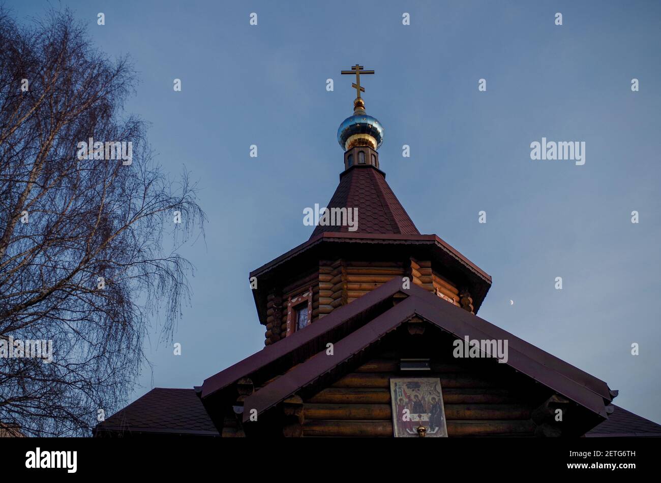Gable roof of wooden Orthodox Church with log walls, six-sided tower ...
