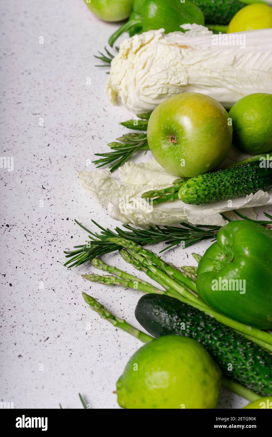 flatlay green organic food. on a light background with space for text ...