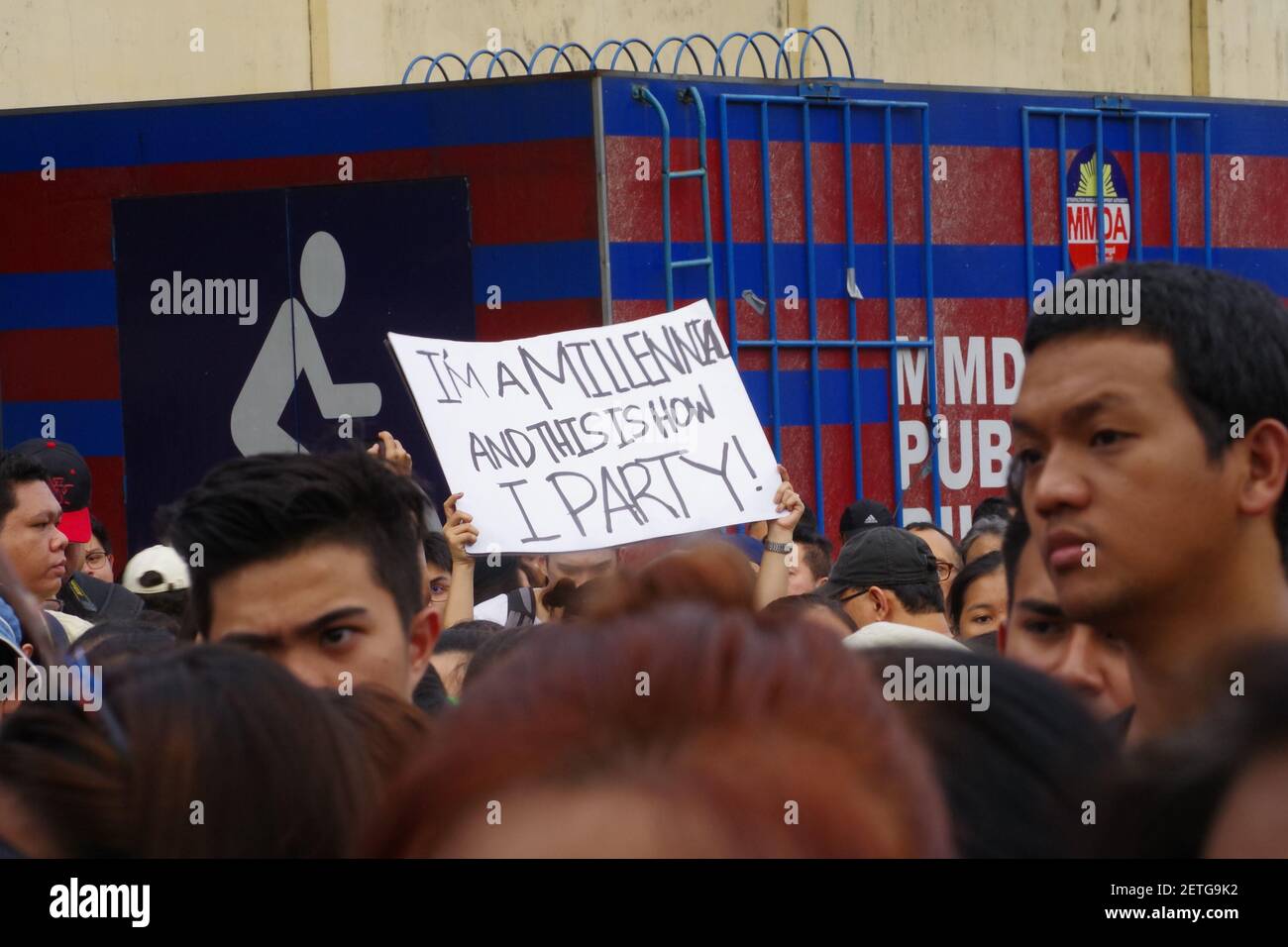 Protesters flash slogans at the People Power Monument in EDSA during ...