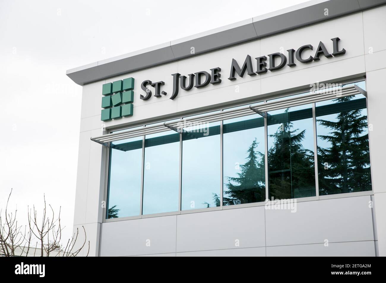 A logo sign outside of a facility occupied by St. Jude Medical, Inc ...