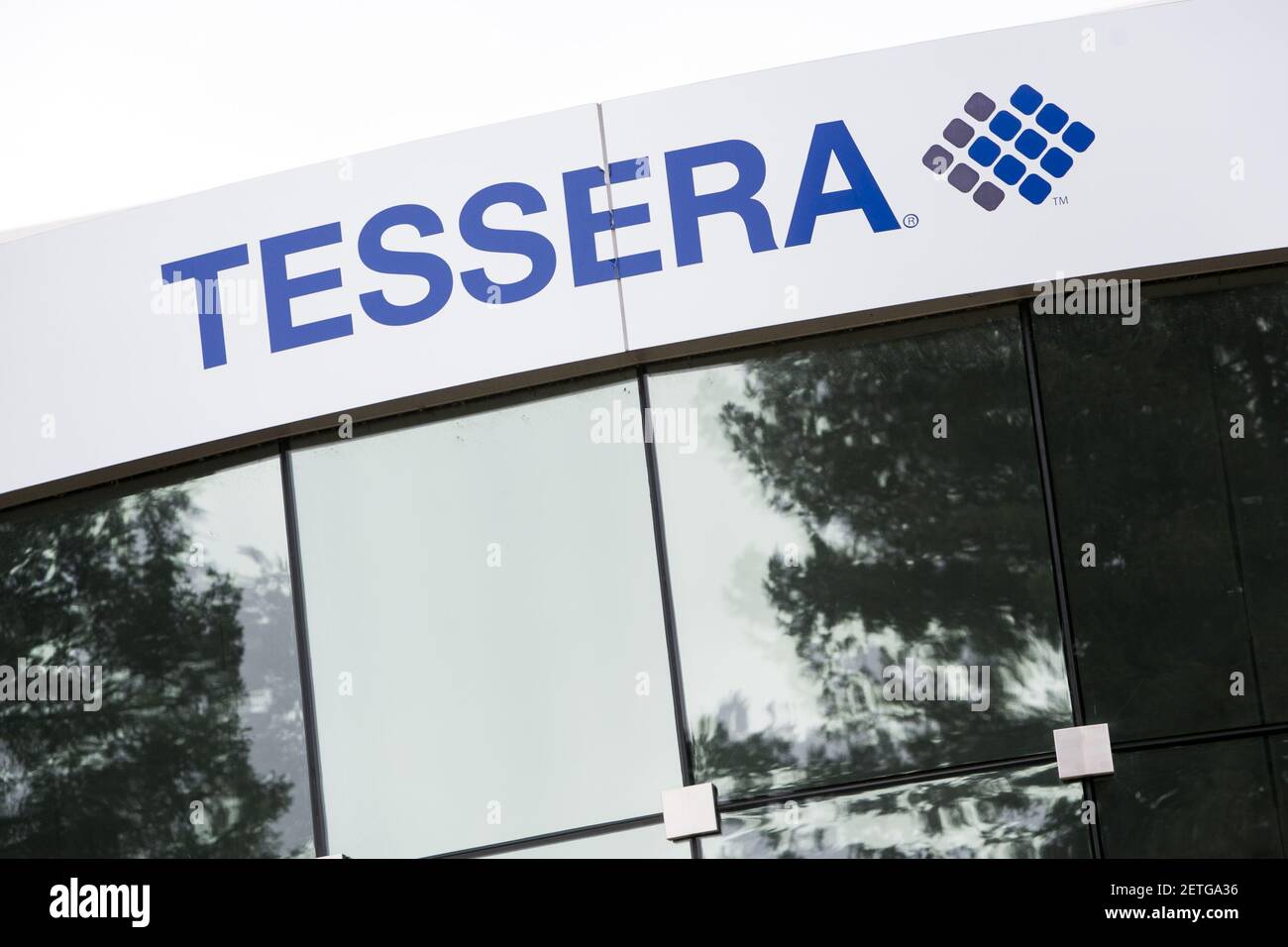 A logo sign outside of the headquarters of Tessera Technologies in San ...