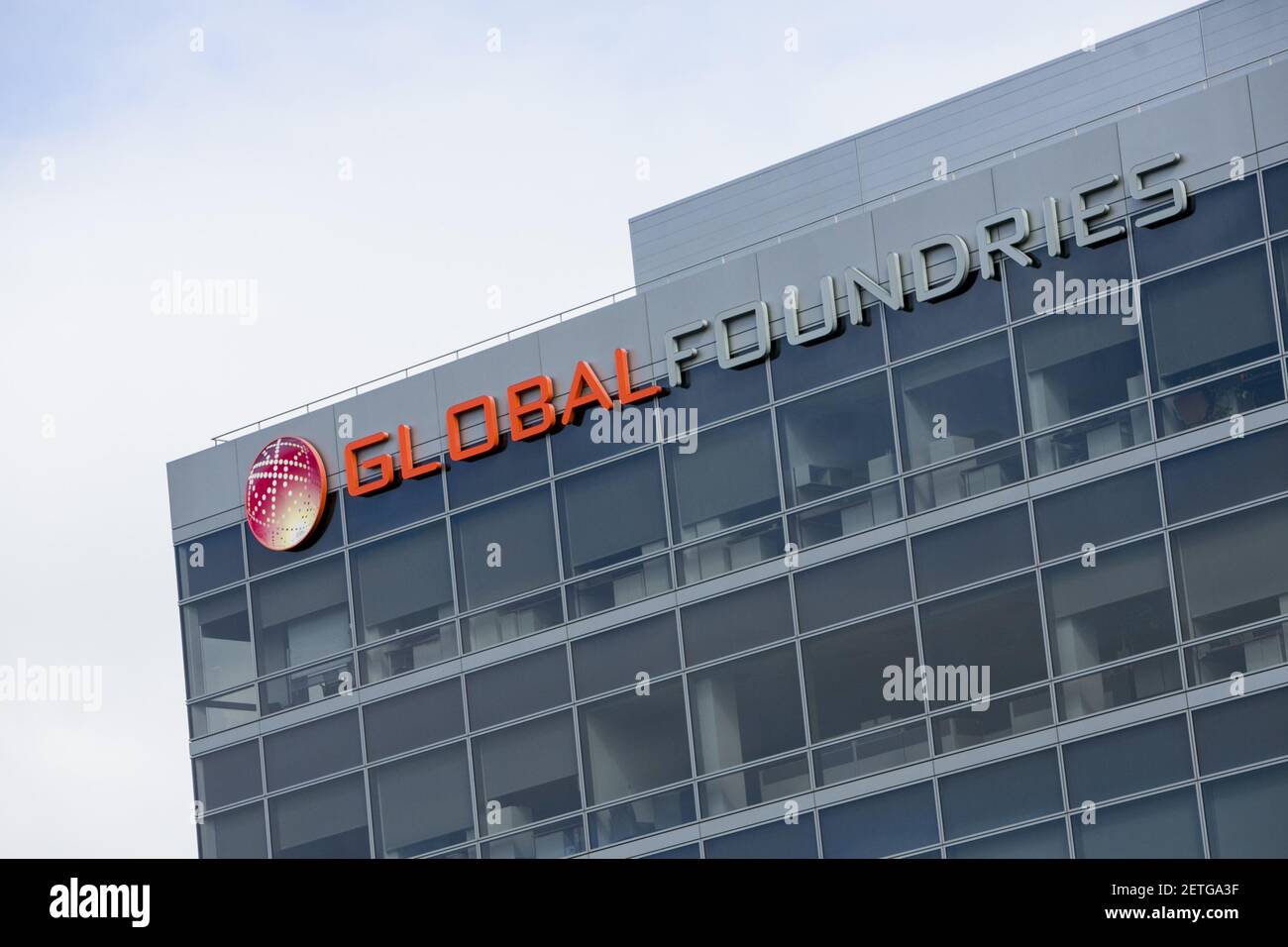 A logo sign outside of the headquarters of GlobalFoundries in Santa ...