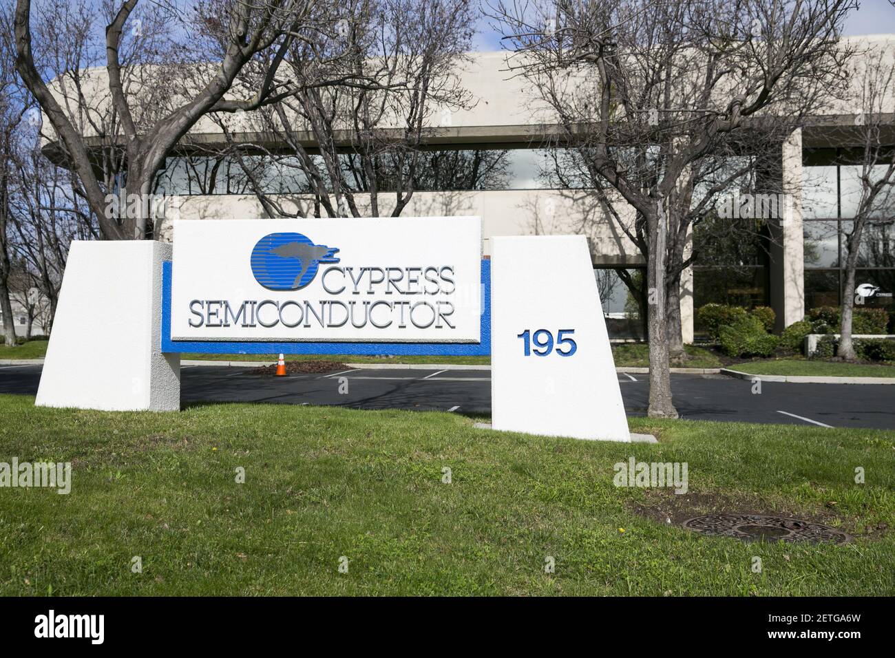 A logo sign outside of the headquarters of Cypress Semiconductor in San ...