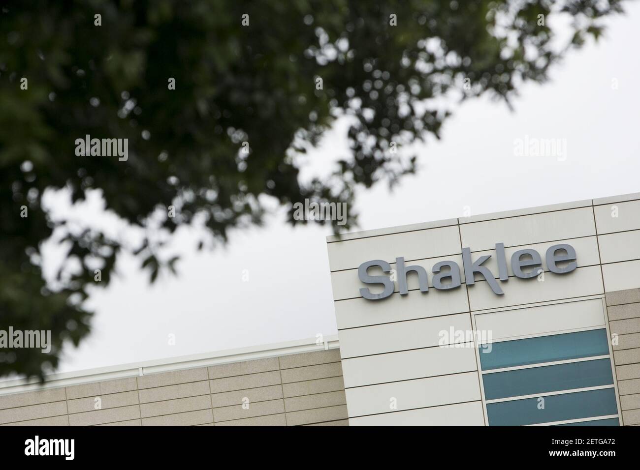 A logo sign outside of the headquarters of the Shaklee Corporation in ...