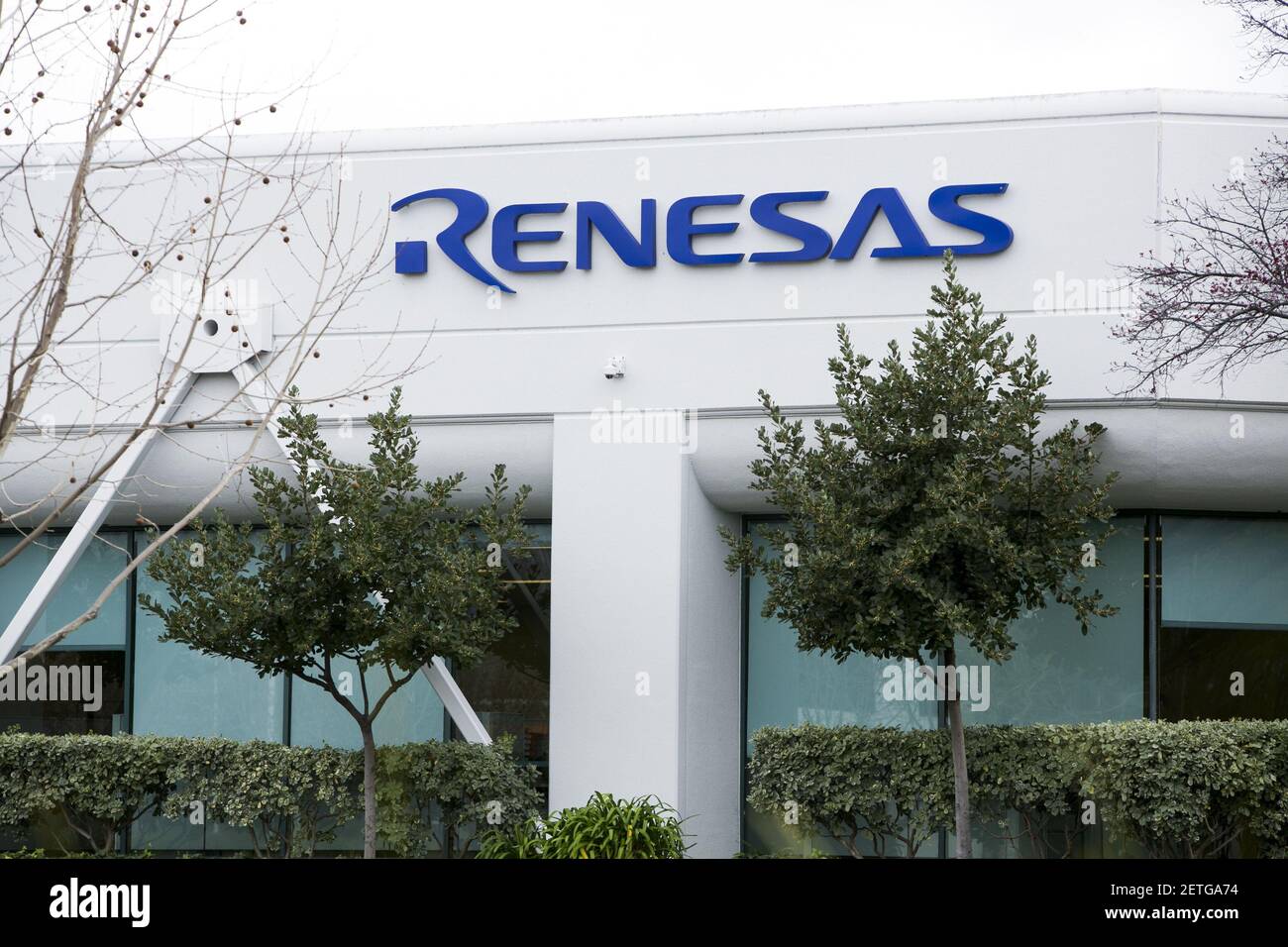 A logo sign outside of a facility occupied by the Renesas Electronics ...