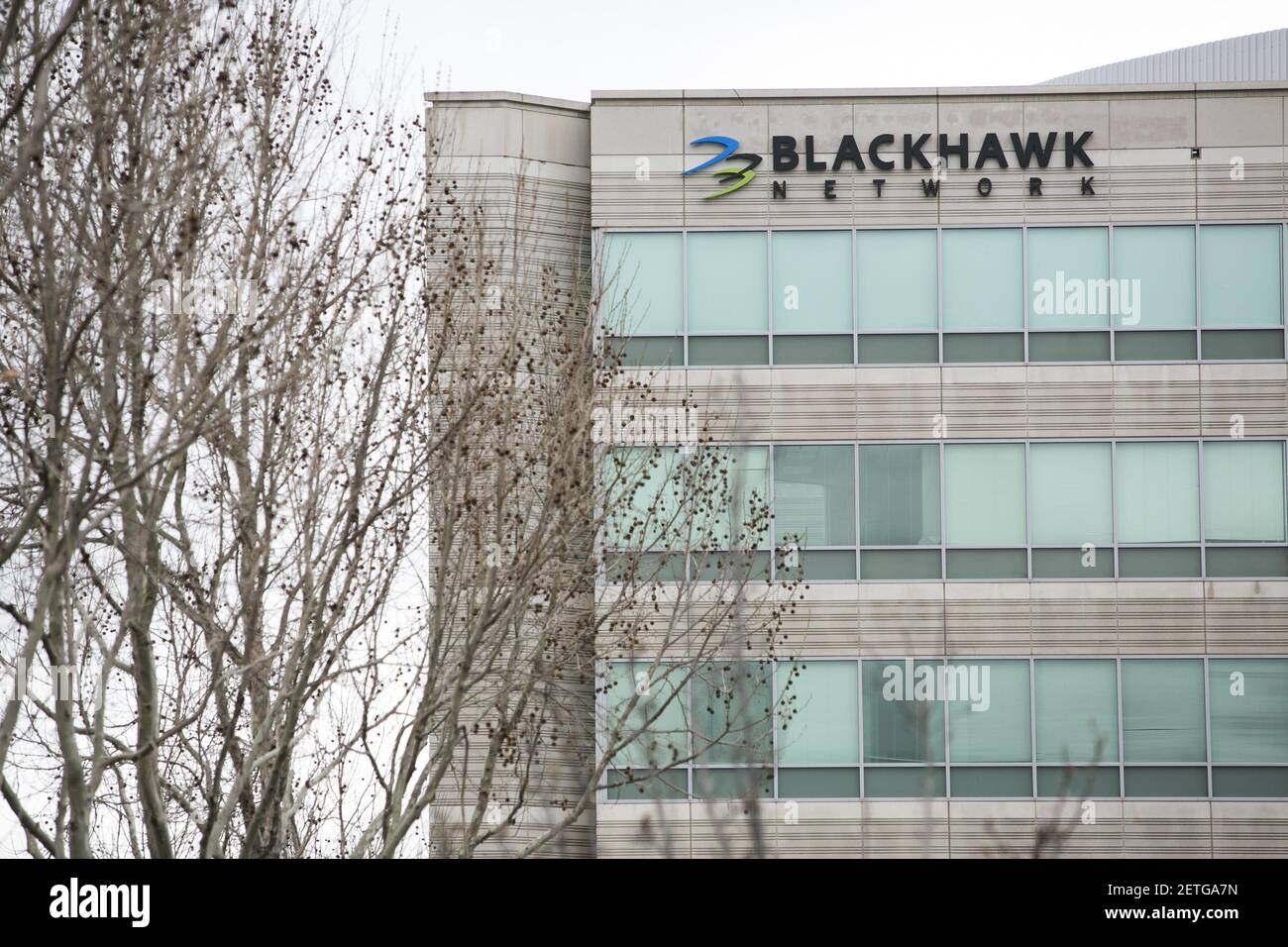 A logo sign outside of the headquarters of Blackhawk Network Holdings ...