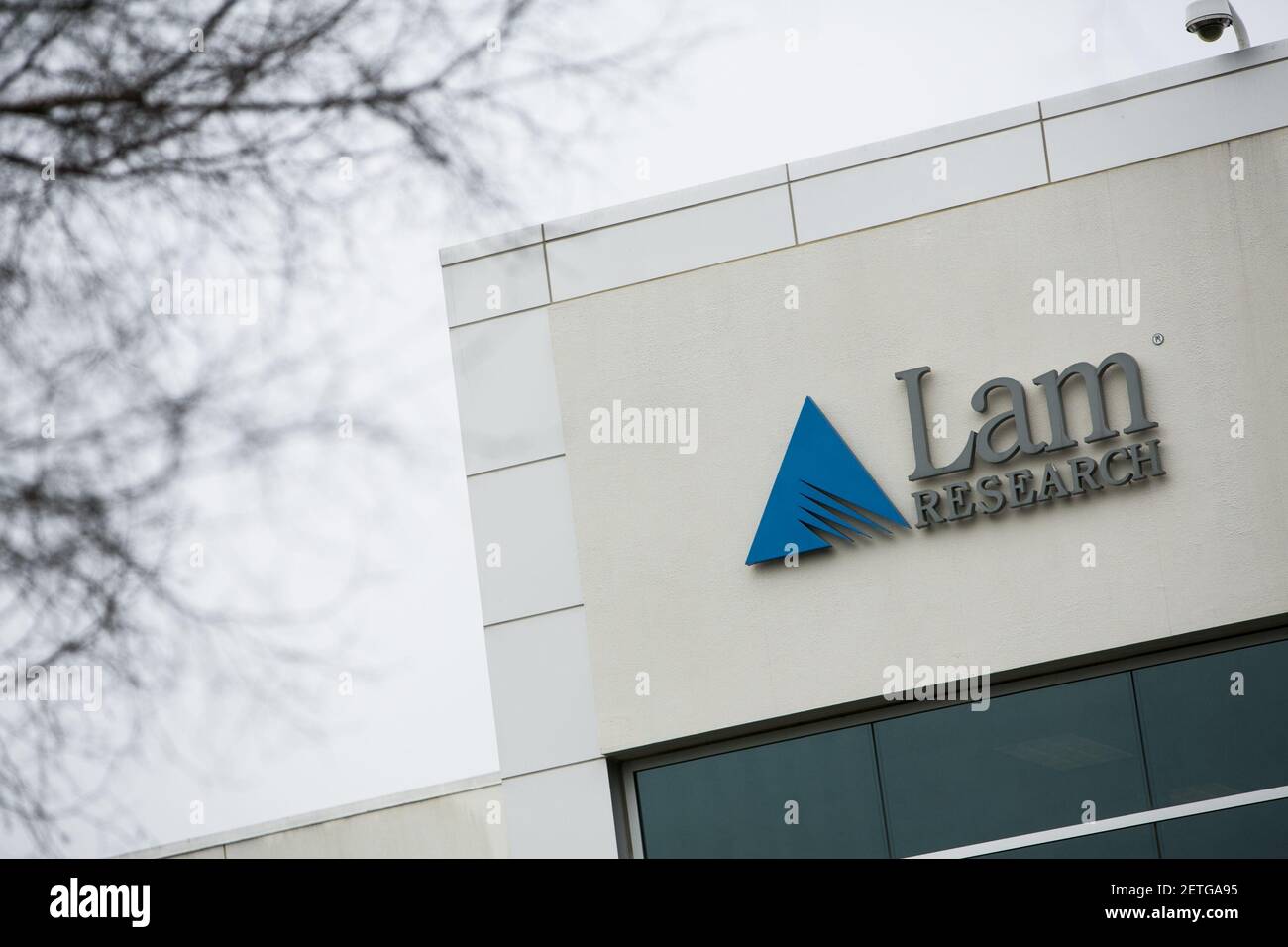A logo sign outside of a facility occupied by the Lam Research ...