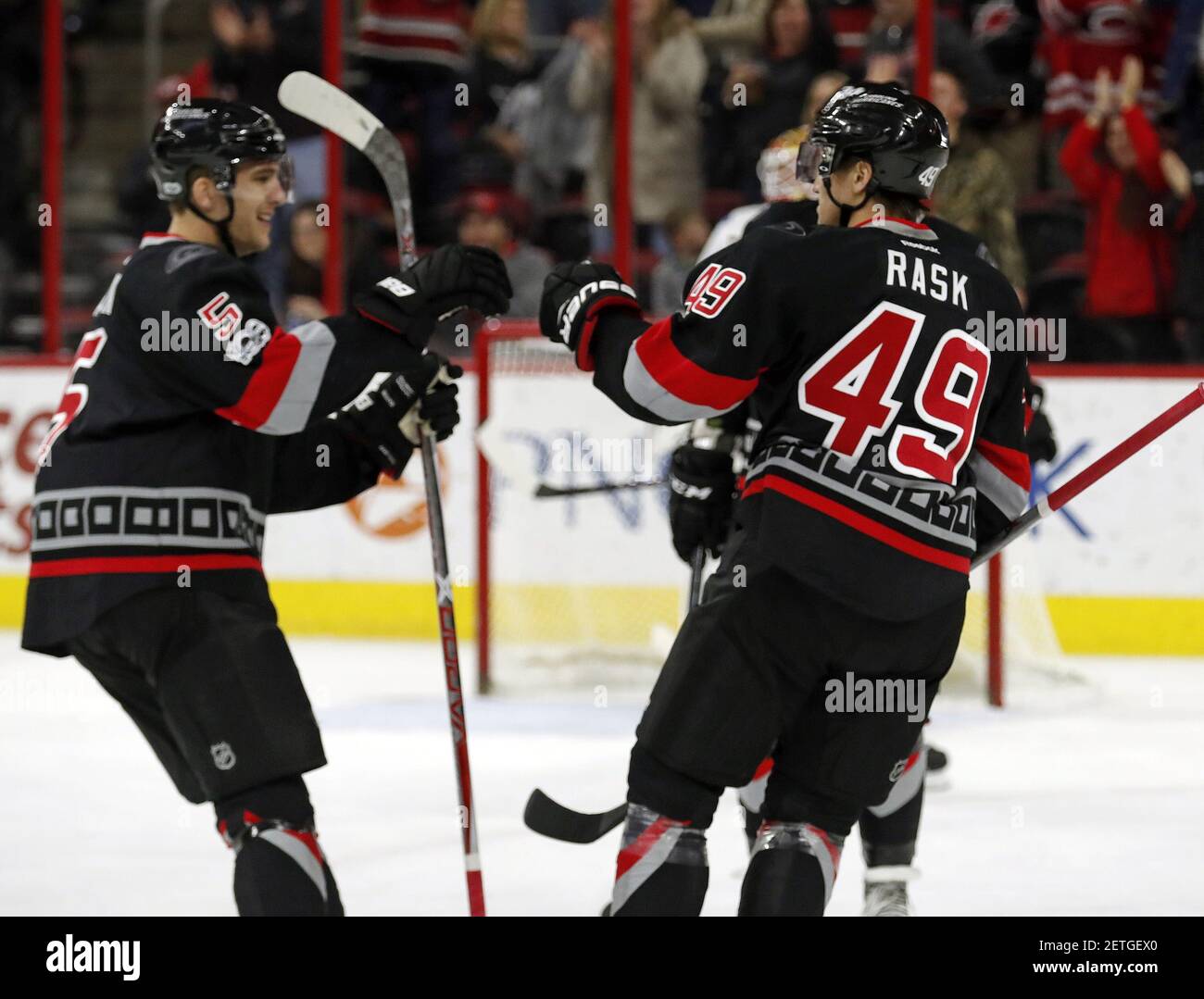 Carolina Hurricanes' Victor Rask (49) celebrates his goal with Noah ...