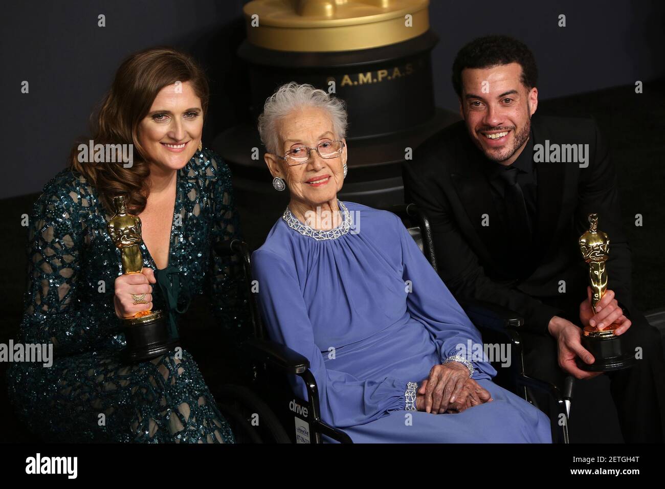 NASA mathematician Katherine Johnson (C) and director Ezra Edelman (R ...