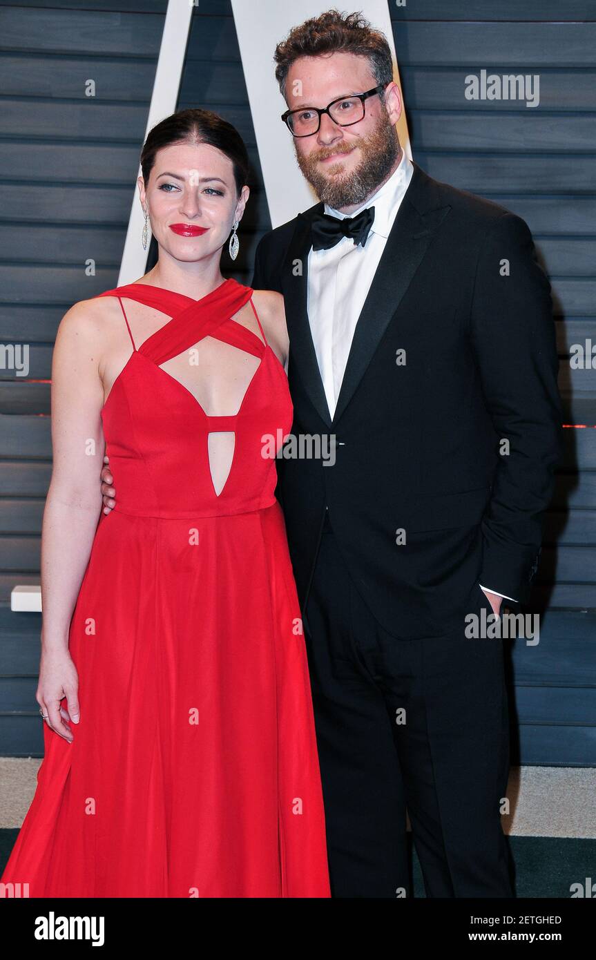 Lauren Miller and Seth Rogen walking the red carpet at the 2017 Vanity ...