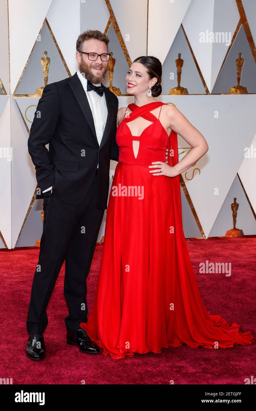 Seth Rogan and Lauren Miller walking the red carpet during the 89th ...