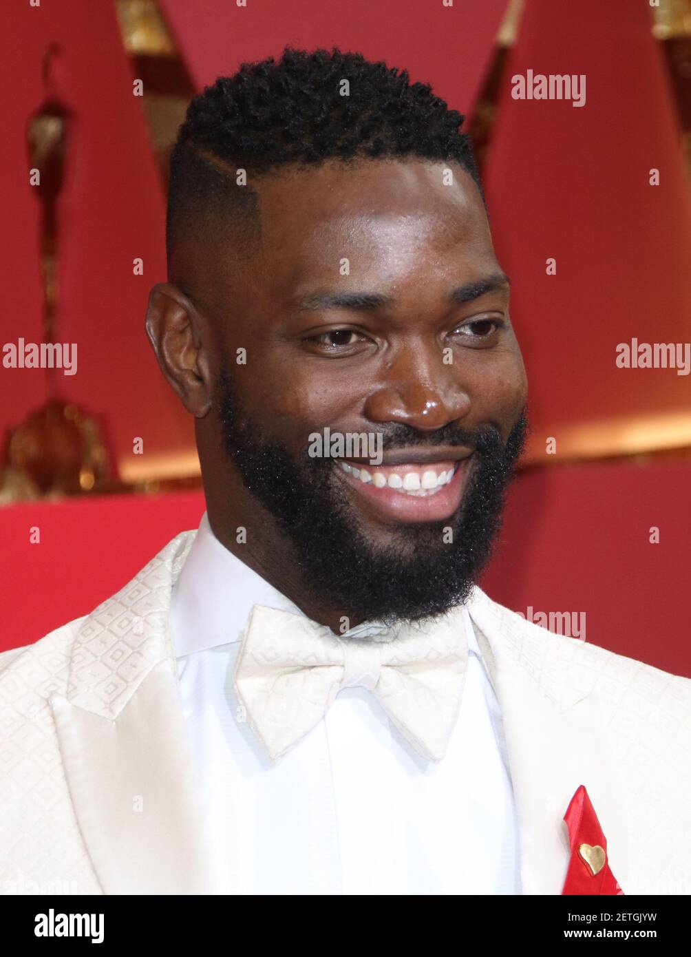 Tarell Alvin McCraney walking on the red carpet during the 89th Academy ...