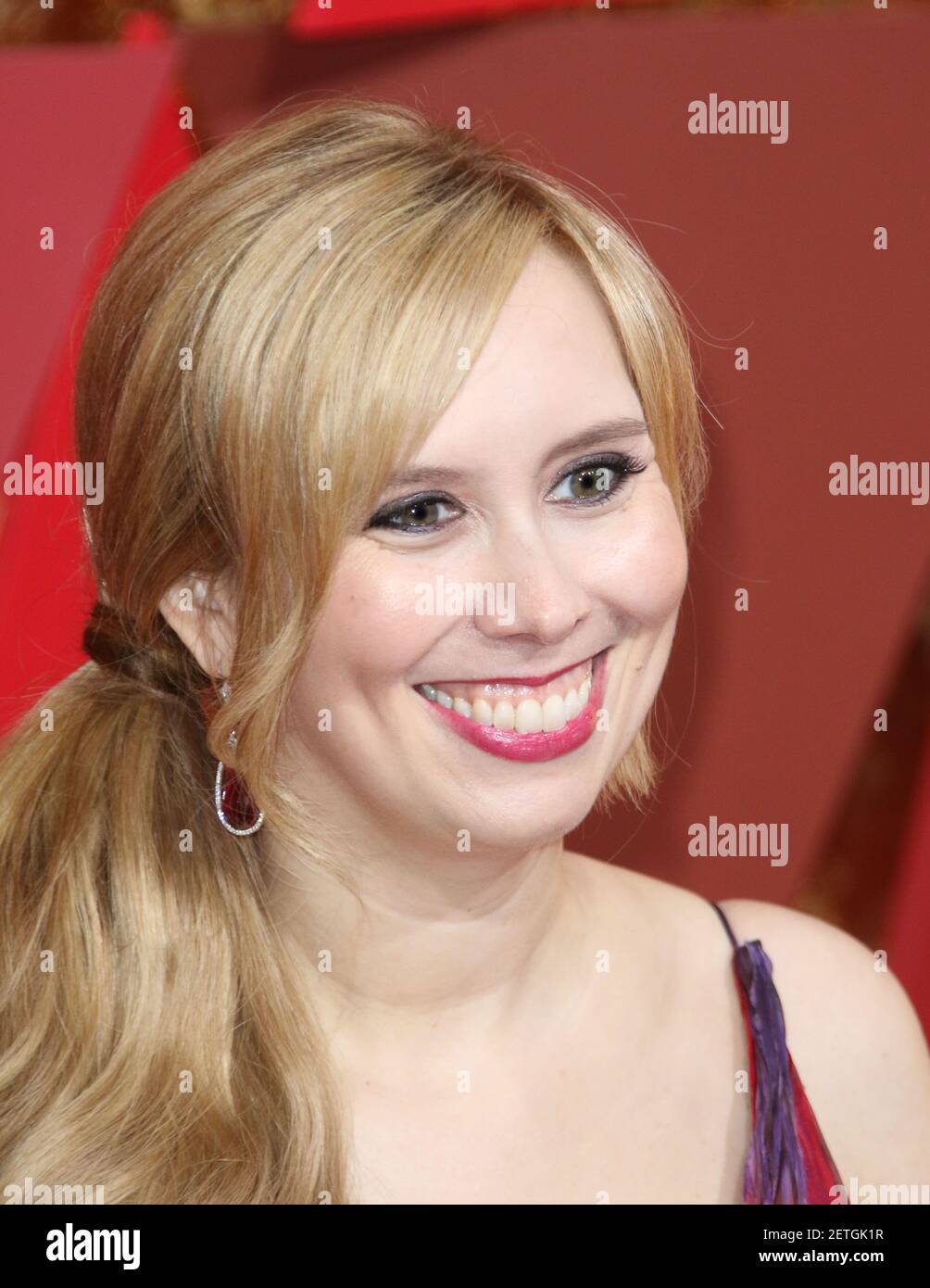 Allison Schroeder walking on the red carpet during the 89th Academy ...
