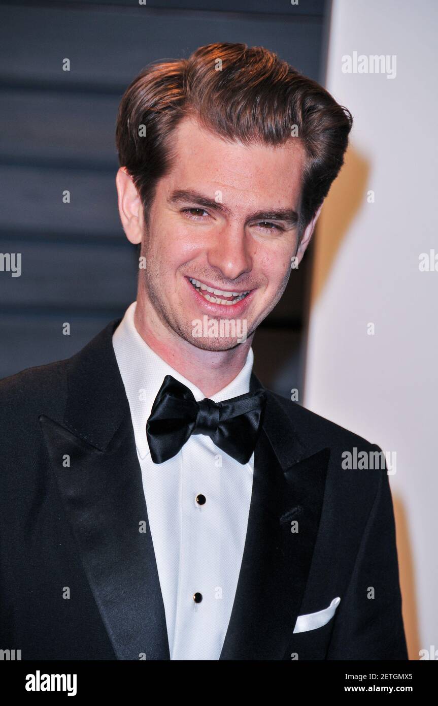 Andrew Garfield walking the red carpet at the 2017 Vanity Fair Oscar ...