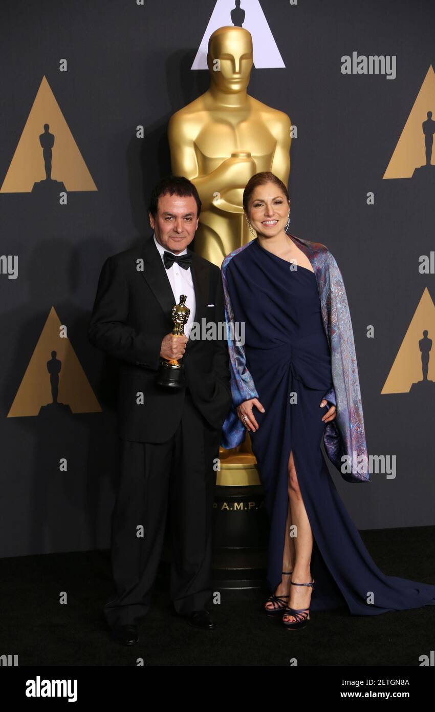 Former NASA scientist Firouz Naderi (L) and engineer/astronaut Anousheh ...