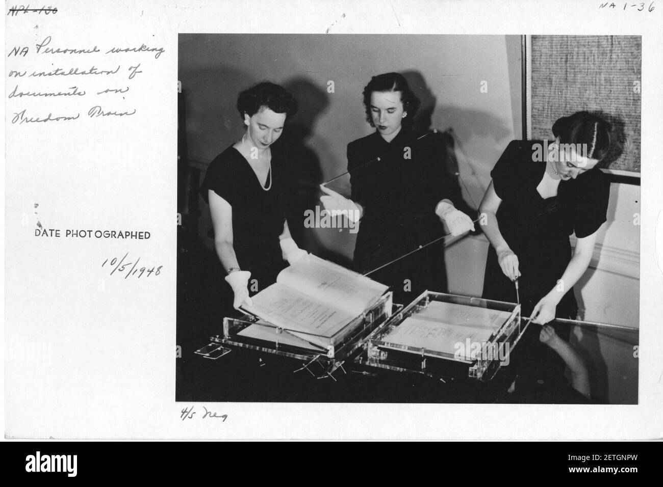 Photograph of National Archives Personnel Working on Installation of ...