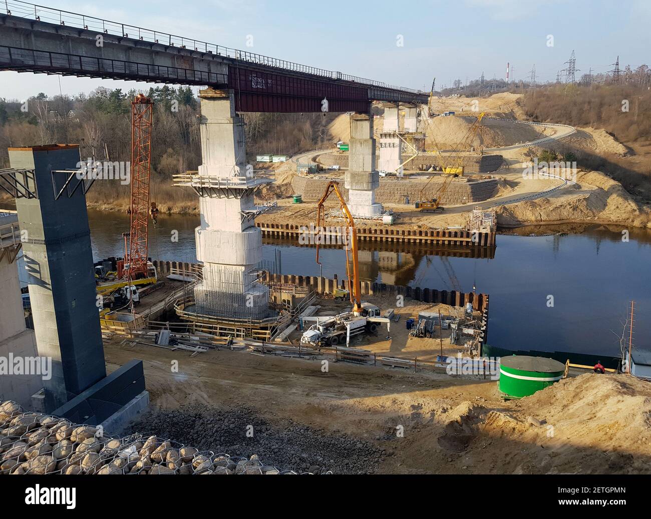 Construction of a new bridge across the river Stock Photo - Alamy