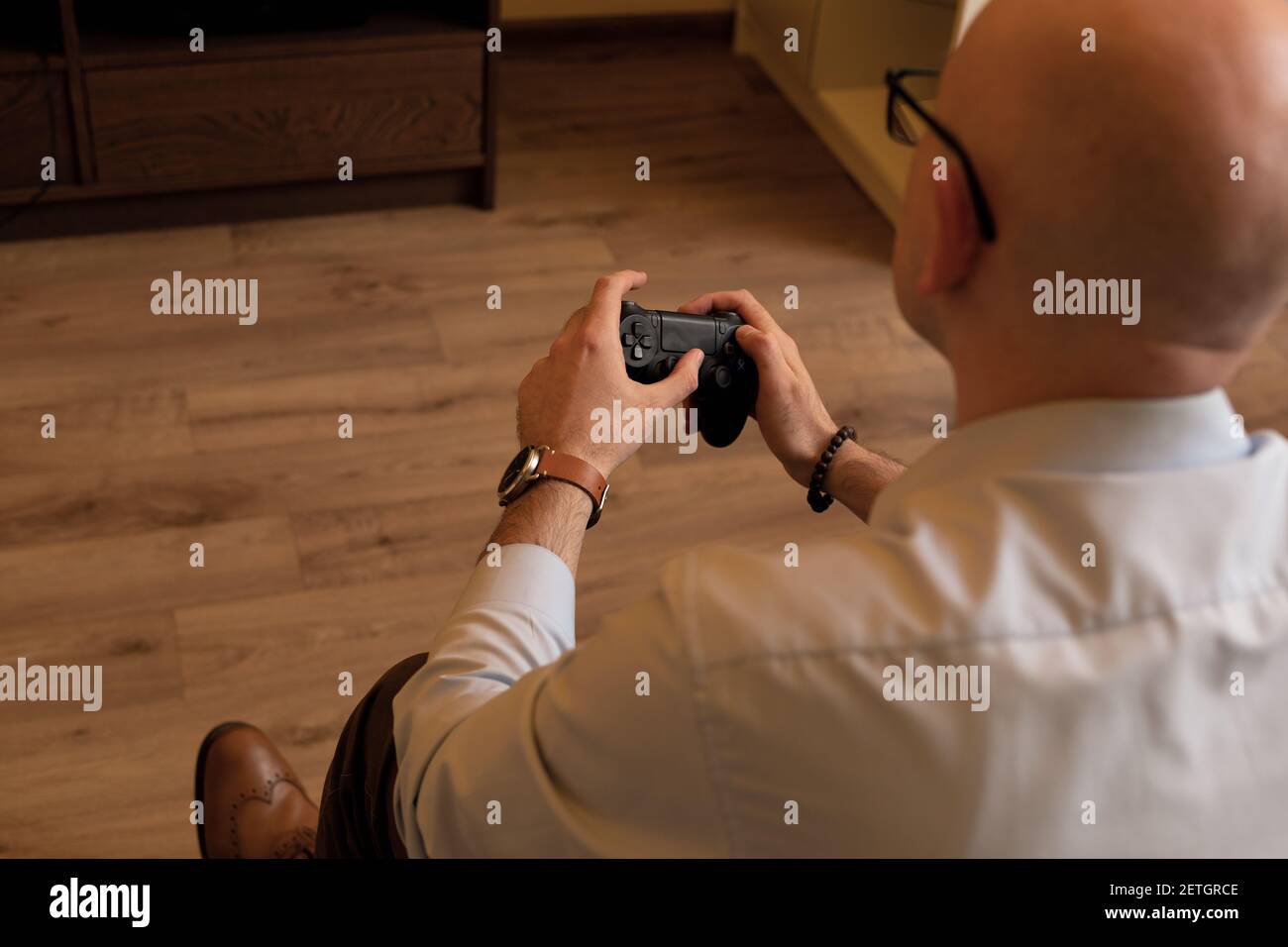 Gaming adult man holding simulator joypad. Person with keypad joystic ...