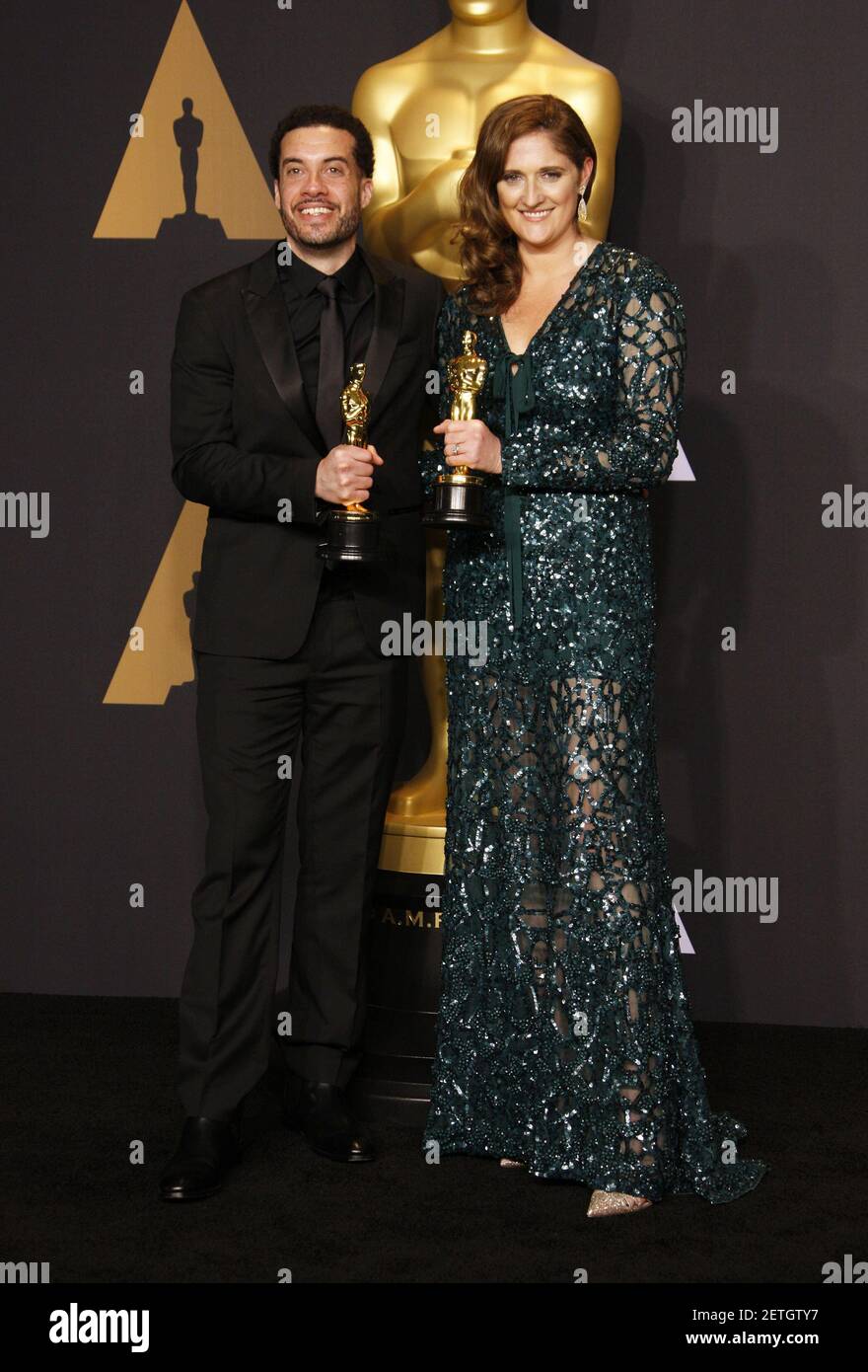Producer Caroline Waterlow and director/producer Ezra Edelman, winners ...