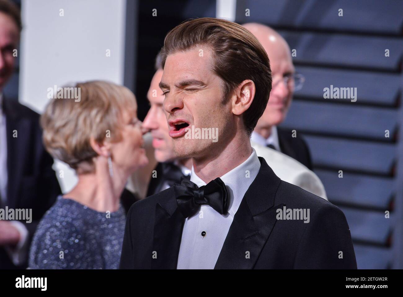 Andrew Garfield walking the red carpet at the 2017 Vanity Fair Oscar ...