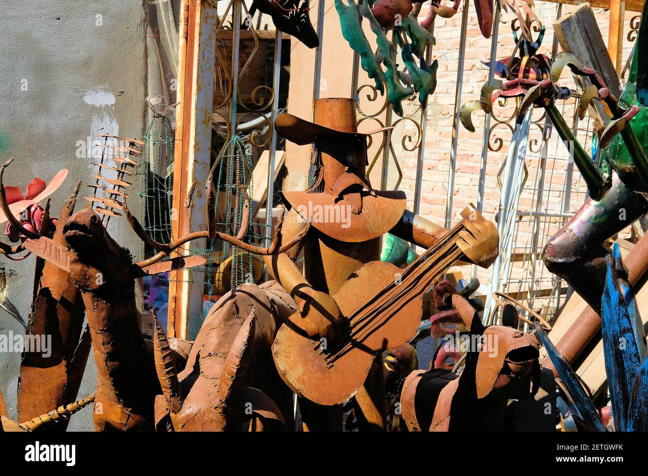 Traditional metal work and folk art at a Mexican curios shop in Los ...