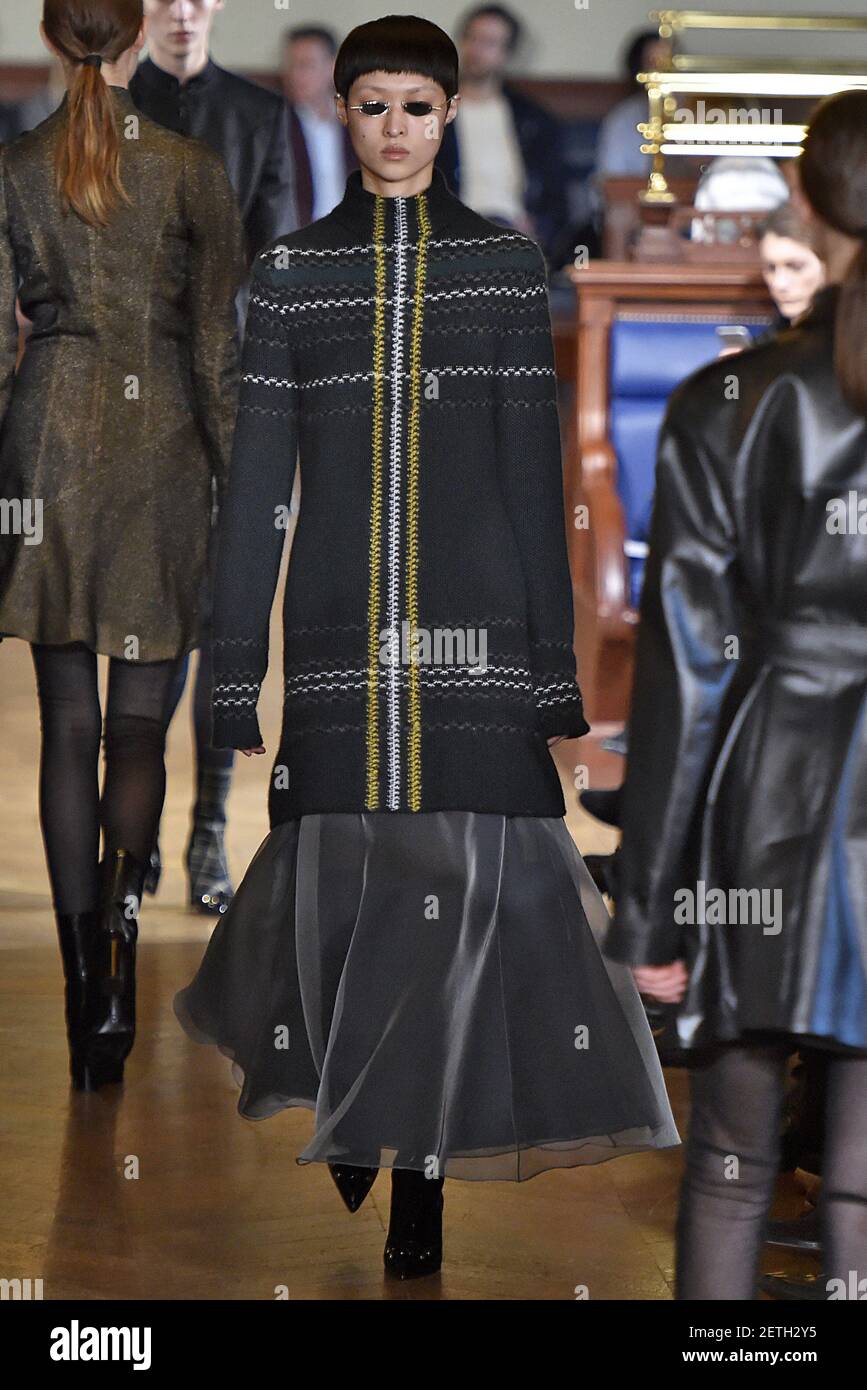 Model Chu Wong walks on the runway during the Olivier Theyskens Fashion ...