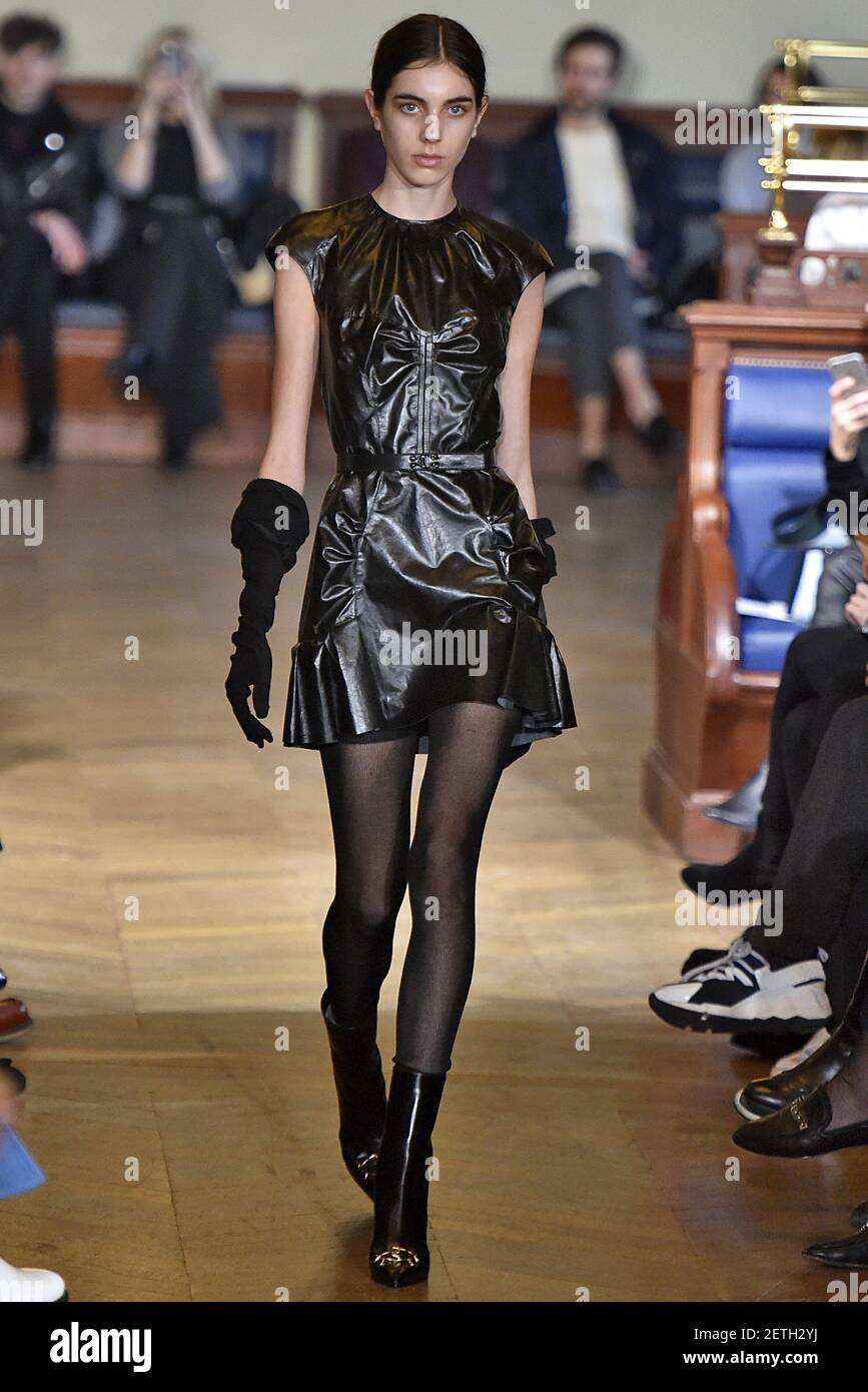 Model Madeleine Knighton walks on the runway during the Olivier ...