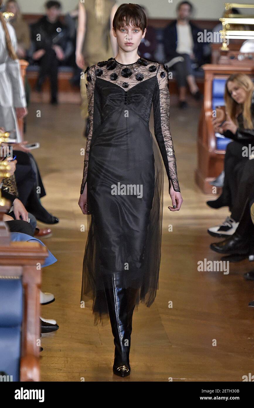 Model Tess Angel walks on the runway during the Olivier Theyskens ...