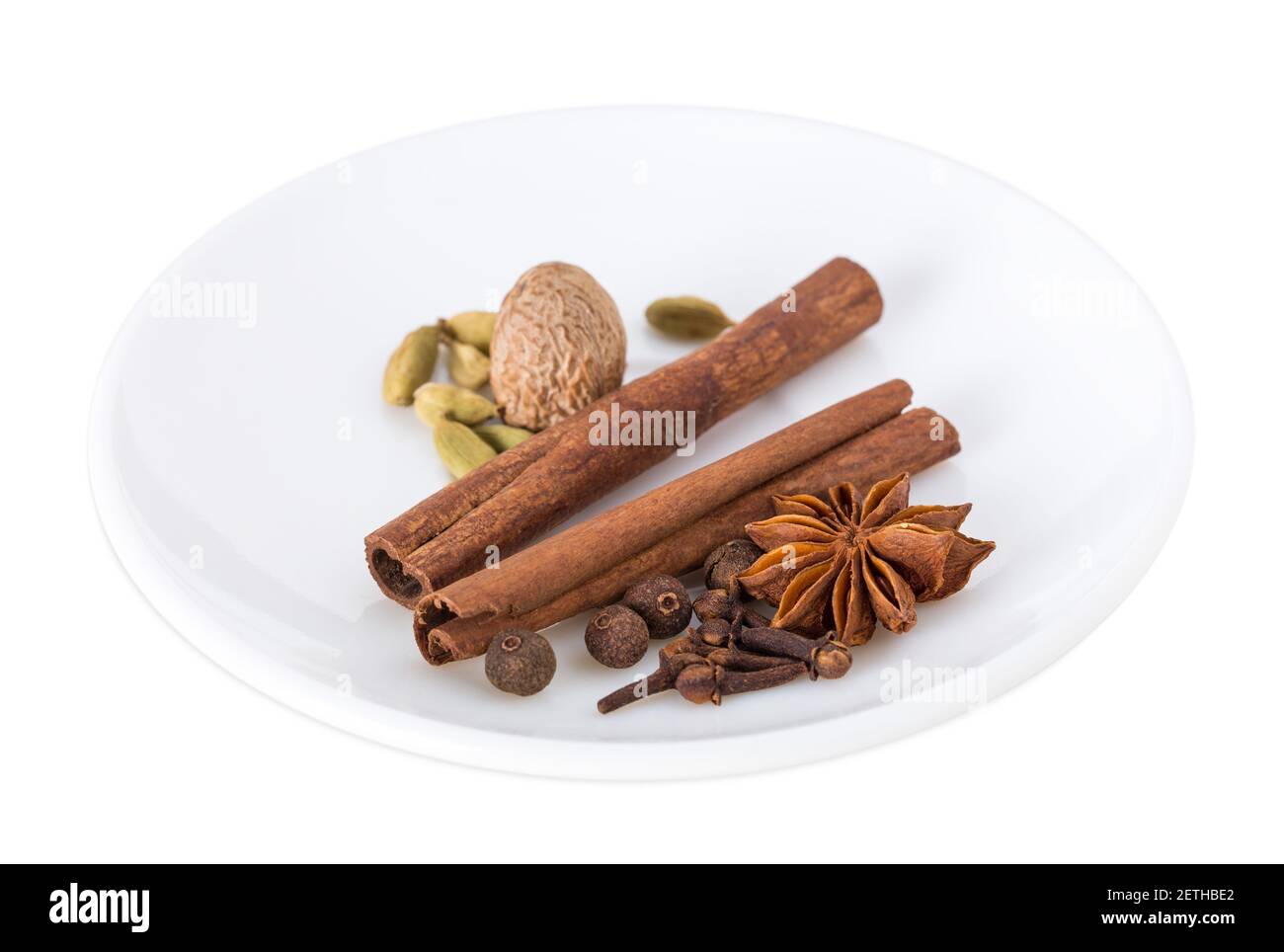 Fragrant spices. Isolated on a white background Stock Photo - Alamy