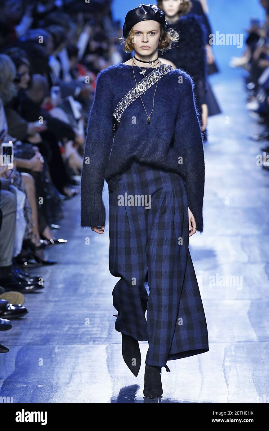 Model Cara Taylor walks on the runway during the Christian Dior Fashion ...