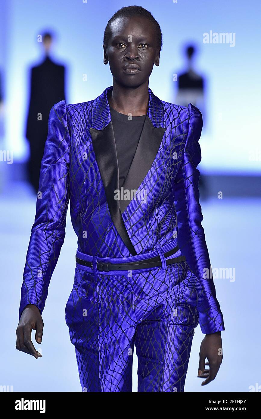 Model Alek Wek walks on the runway during the Haider Ackermann Fashion ...